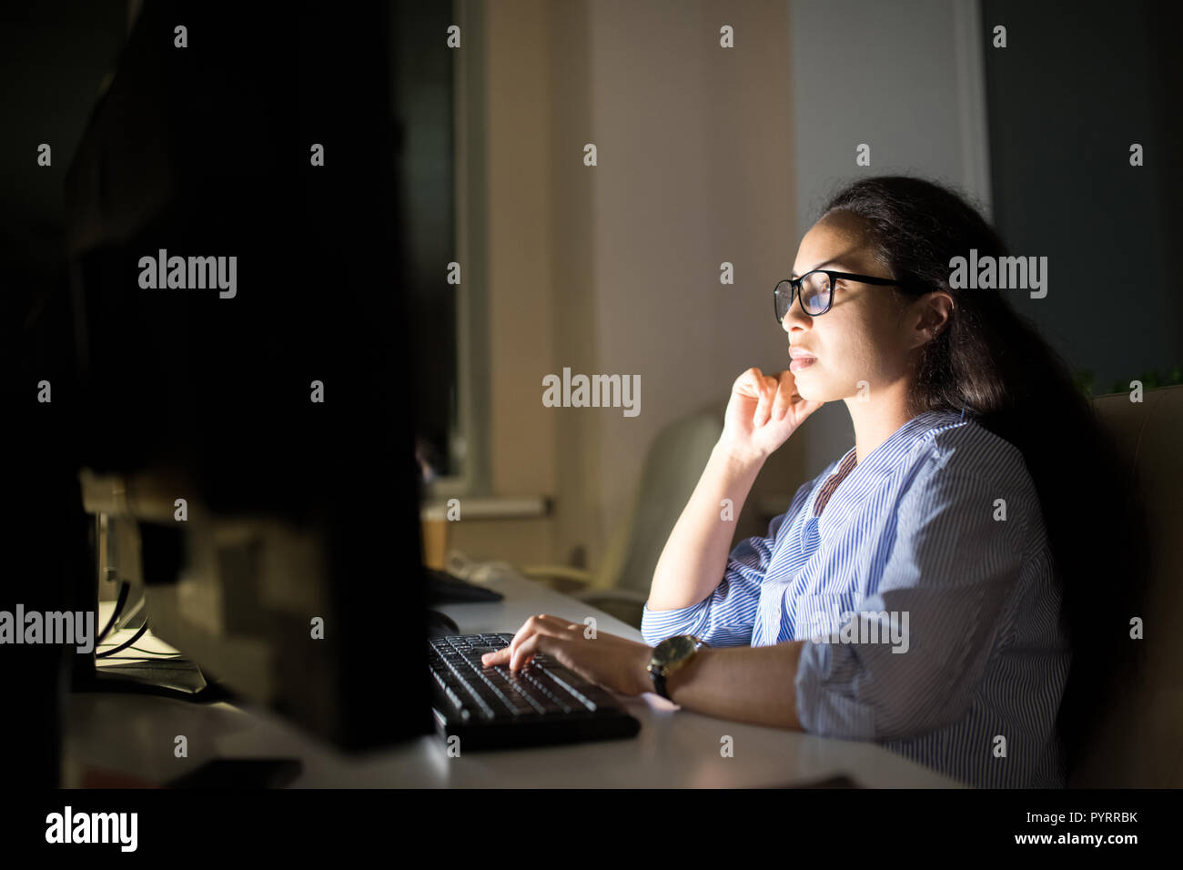 Female Boss Working at Night Stock Photo - Alamy