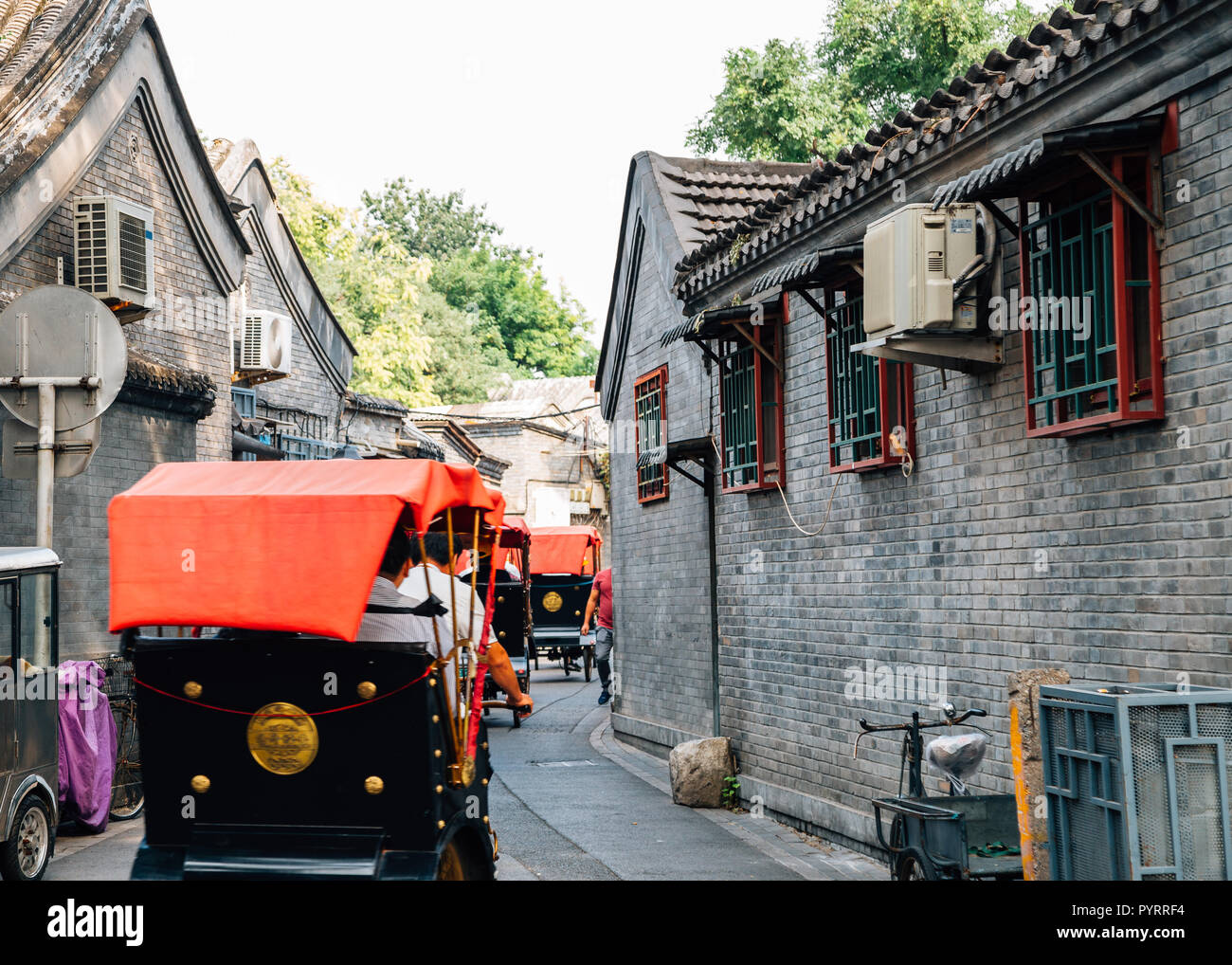 Chinese old street Hutong and traditional rickshaw at Shichahai in ...