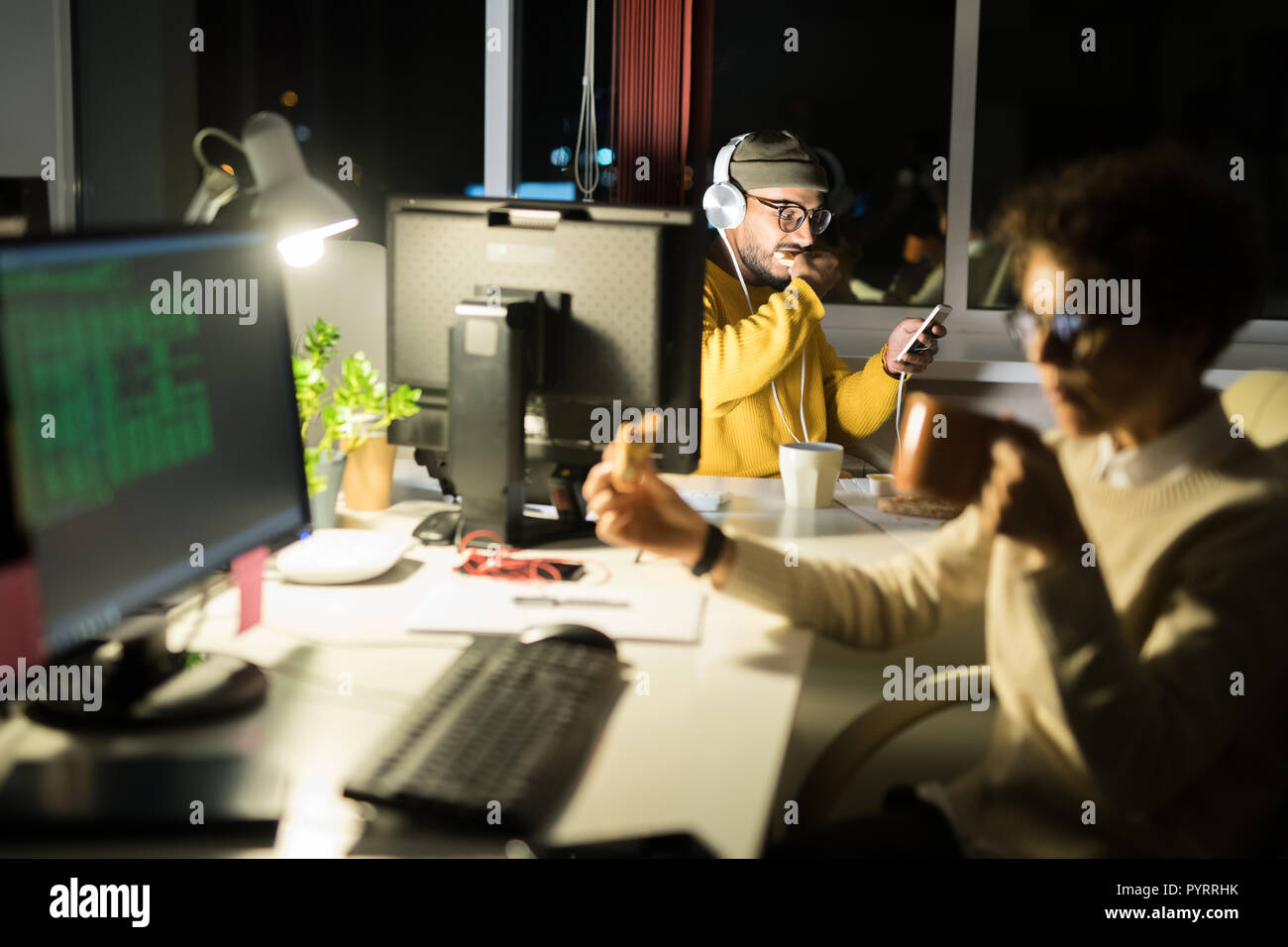 Creative People Working in Studio Stock Photo - Alamy