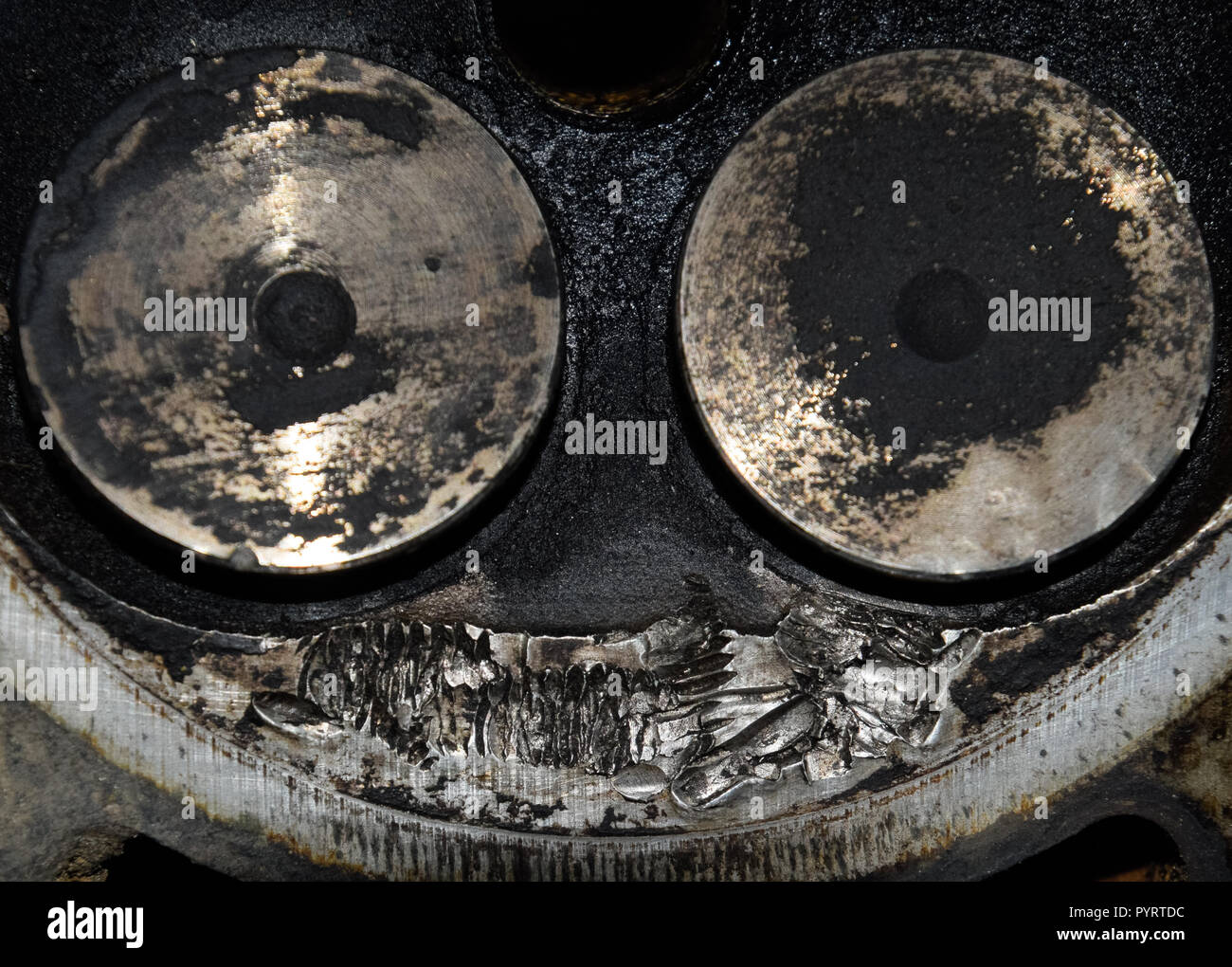 Valve in a deposit on the removed cover of the engine valve box Stock ...