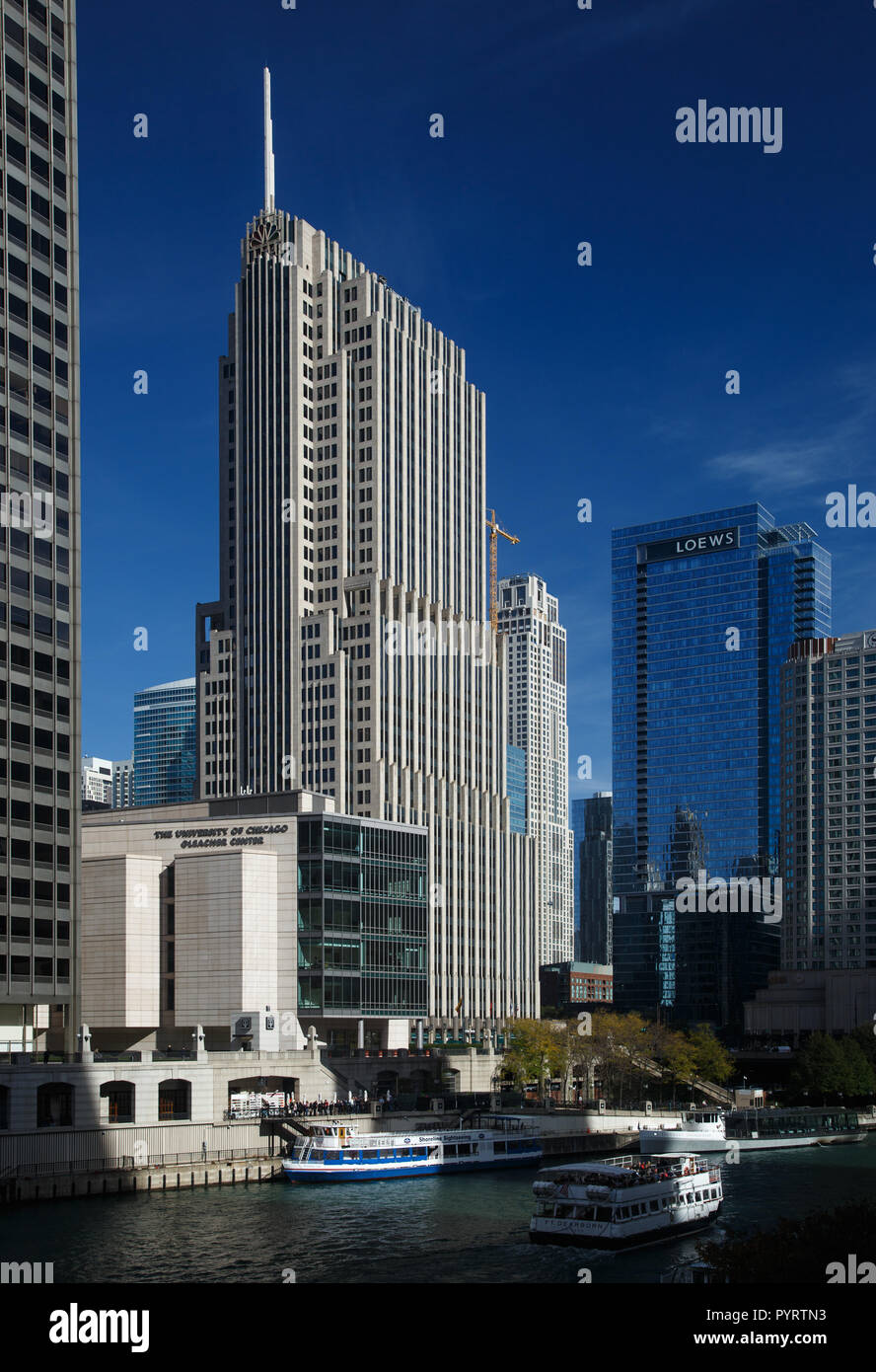 The NBC Tower and Loews Hotel Tower with boats running by the feet of ...