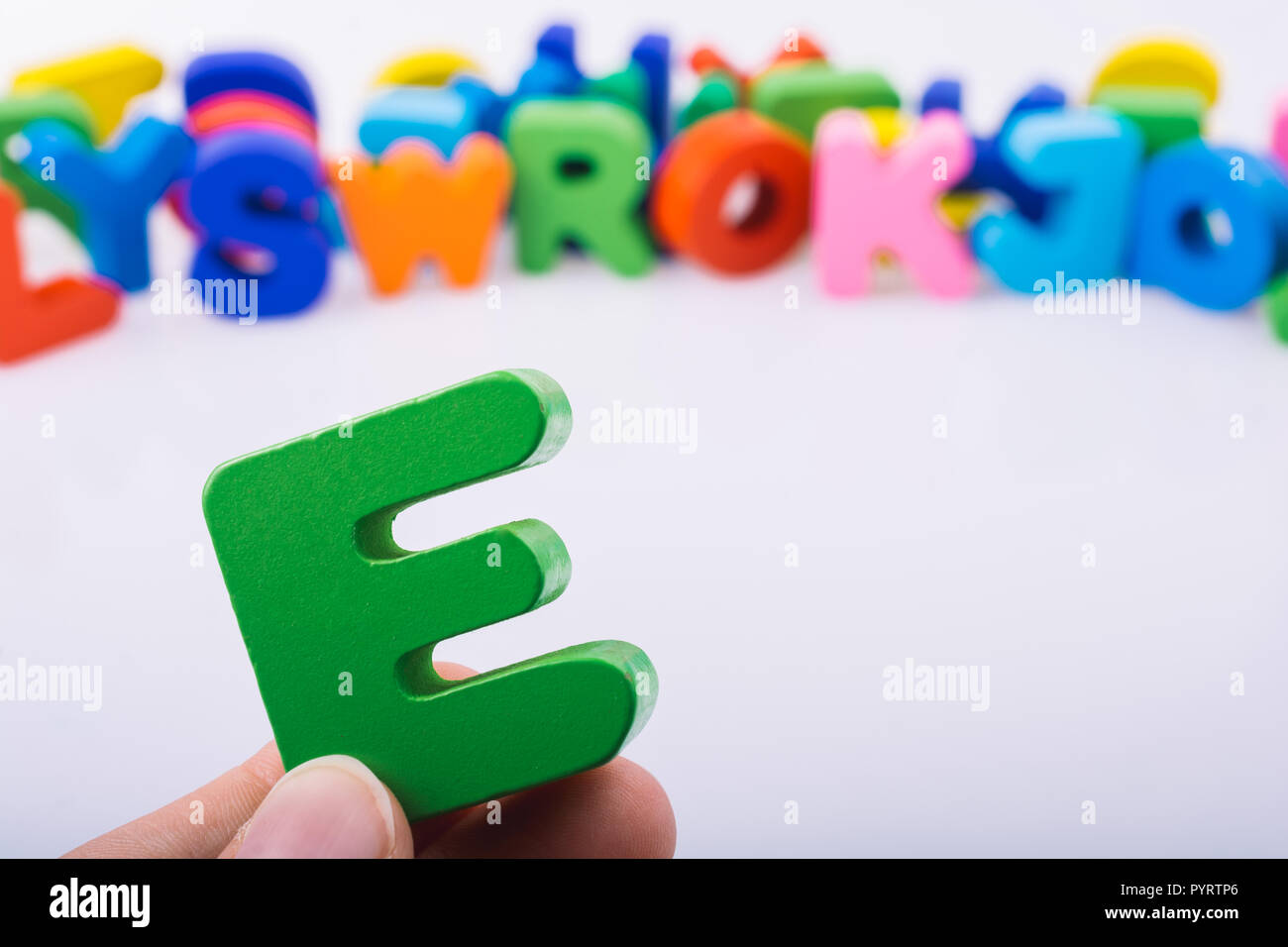 E Letter cubes of Alphabet made of wood Stock Photo - Alamy