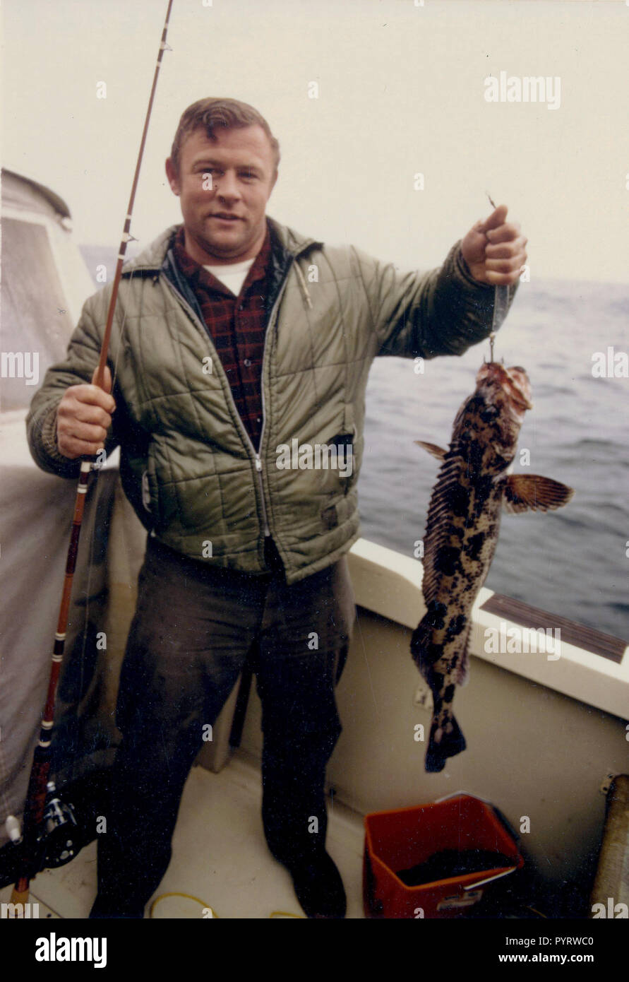 1970s fisherman with fish hi-res stock photography and images - Alamy