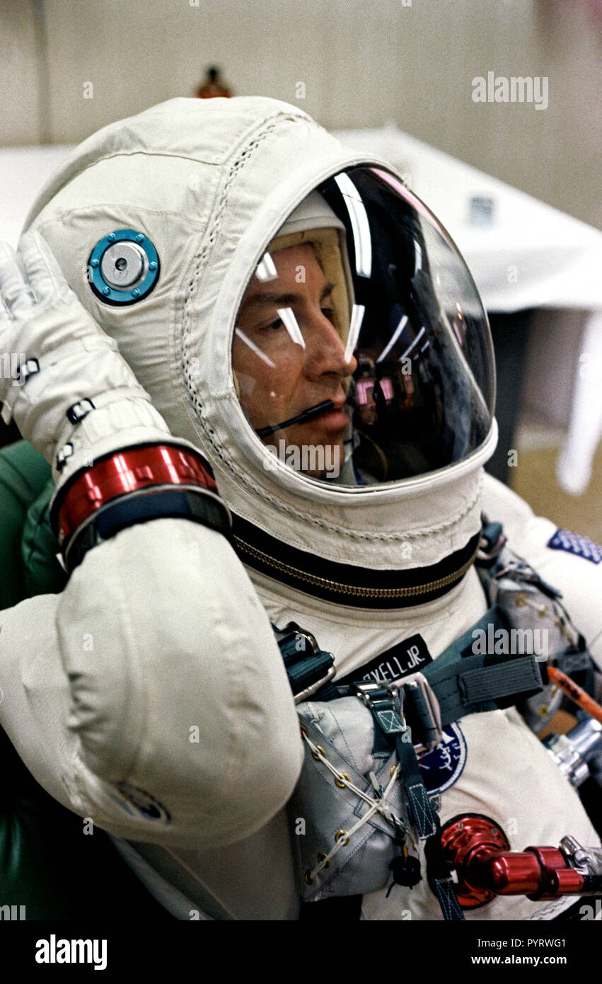(4 Dec. 1965) --- Astronaut James A. Lovell Jr., pilot of the Gemini-7 spaceflight, relaxes in ...
