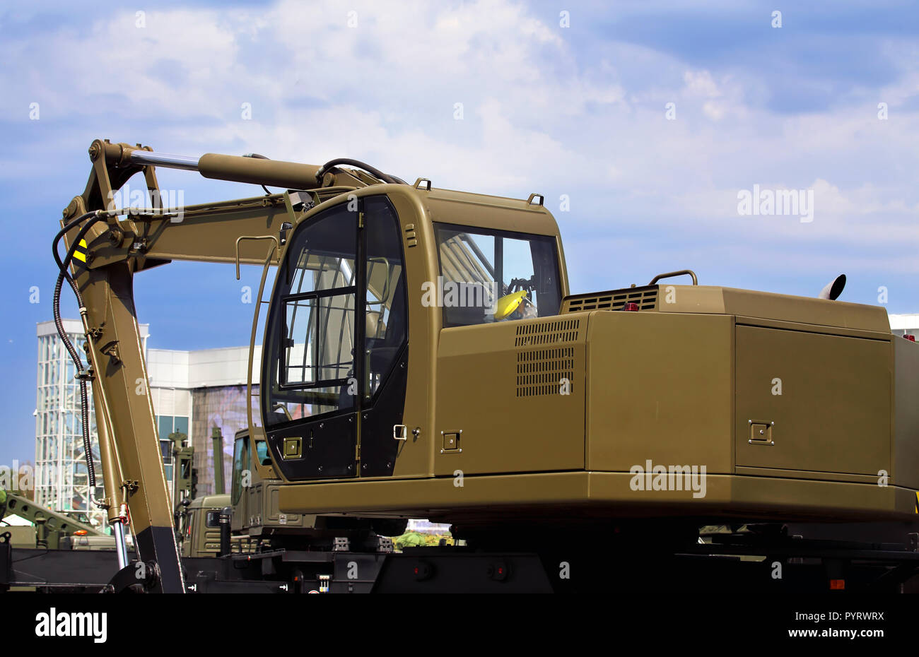 Excavator cabin with arm of manipulator and hydraulic drive Stock Photo ...