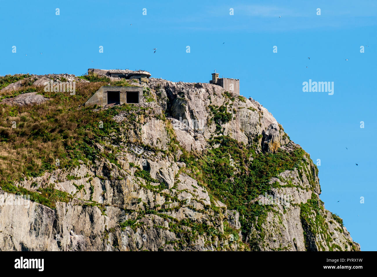 World War II bunkers on the cliffs of Caines Head overlooking ...