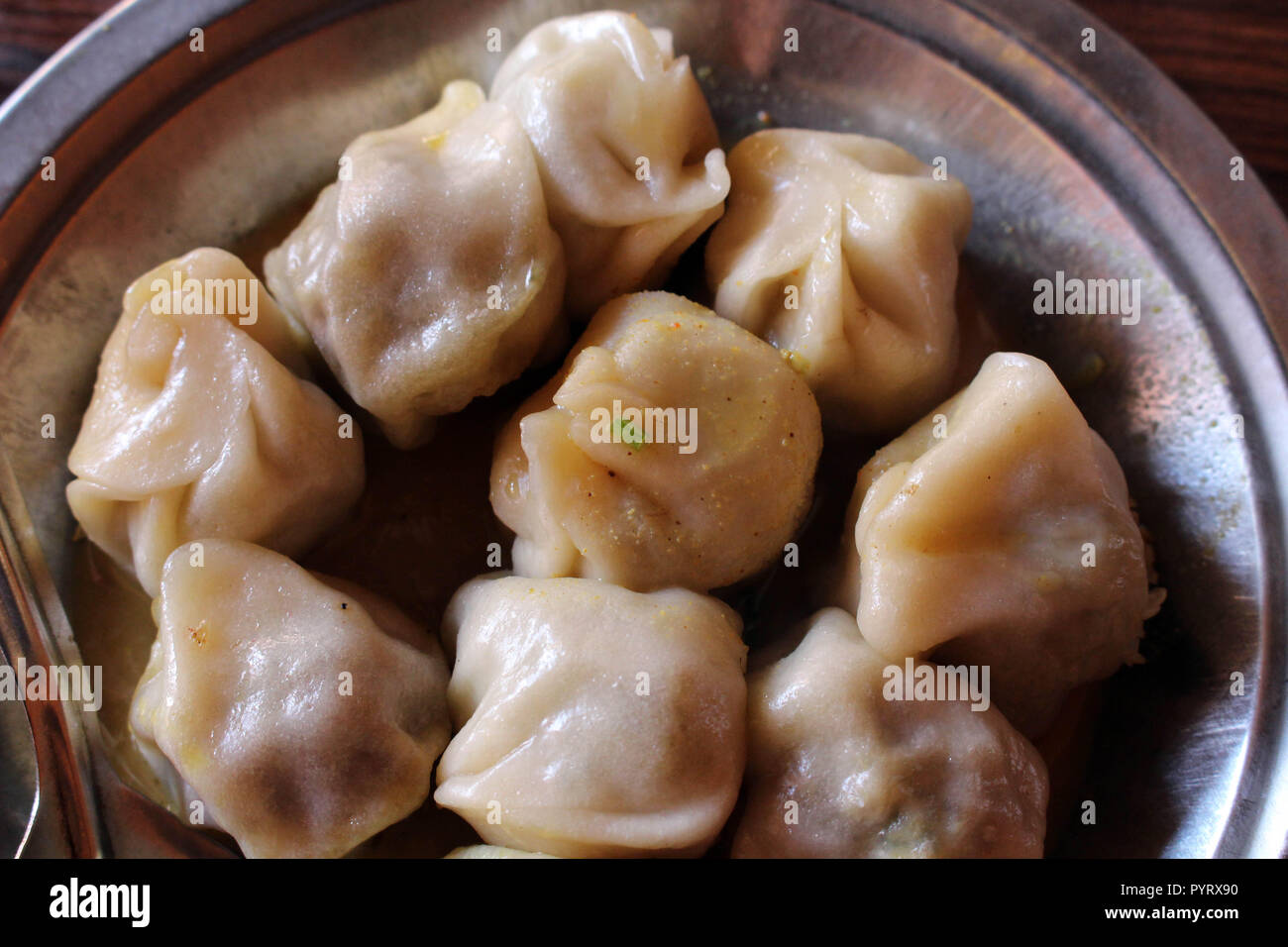 A plate of Momo, the South Asian or Tibetan style dumpling. Taken in ...