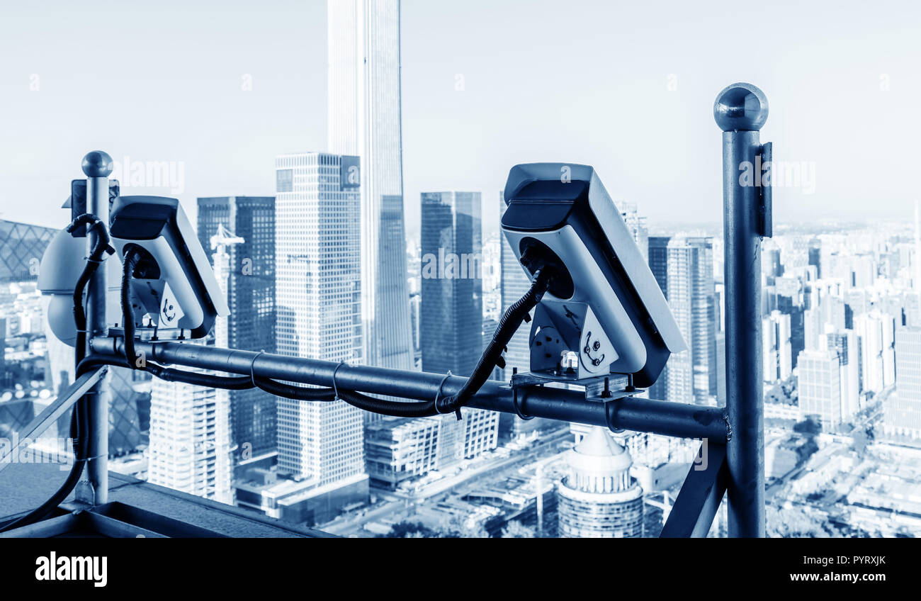 The security cameras on a balcony high building.Used to view road ...