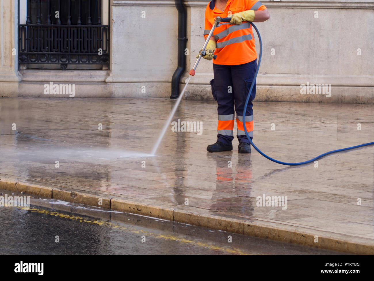 City workers - cleaning and washing of city streets Stock Photo - Alamy