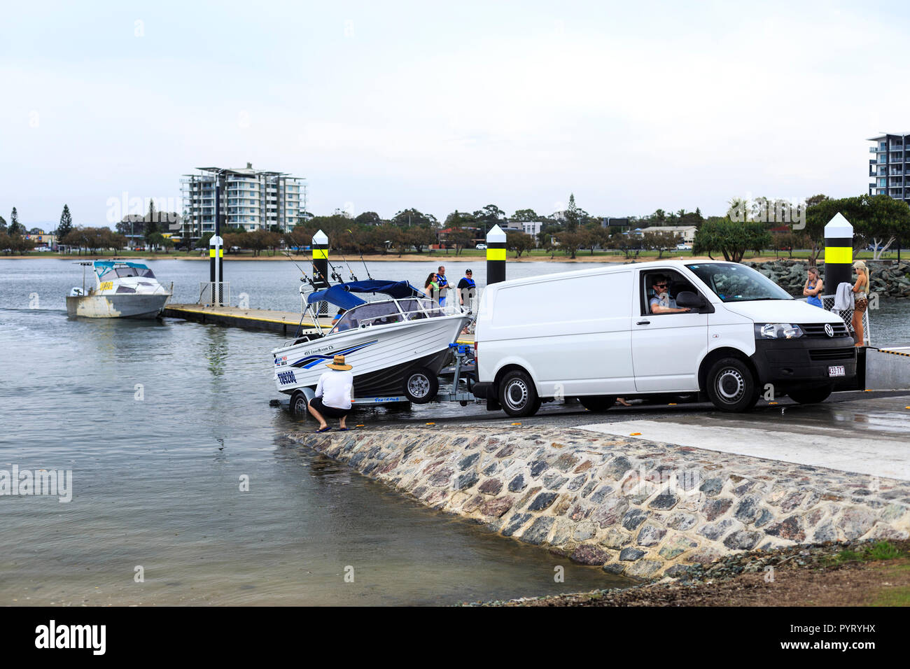 Prepare to launch a recreational fishing boat at the boat ramp in the ...