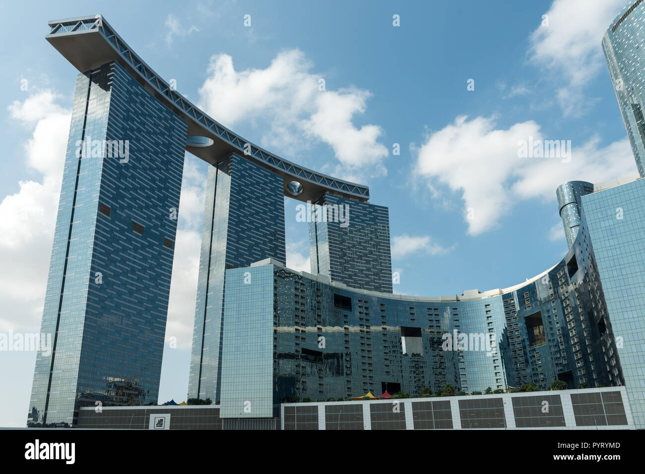 Skyscrappers of Al Reem Island against cloudy sky, Shams Gate District ...