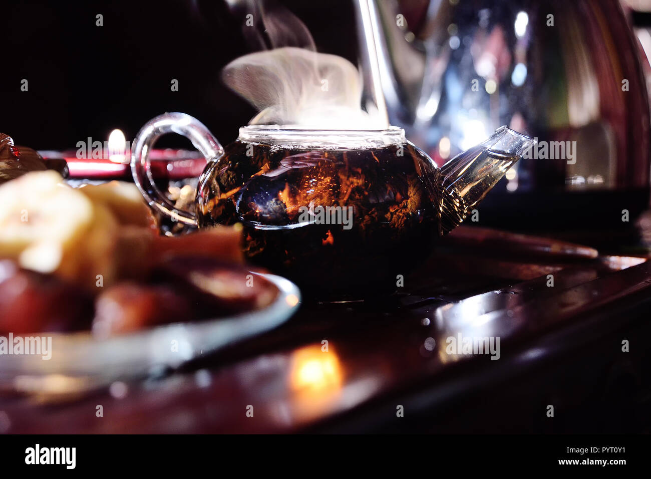 Beautiful teapot on a tea table. Tea ceremony Stock Photo - Alamy
