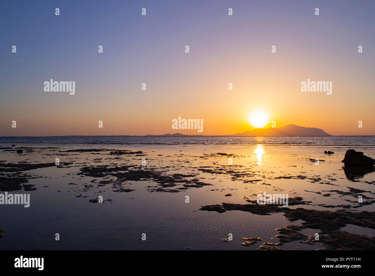 Colorful sunset over the Red sea in Egypt Stock Photo - Alamy