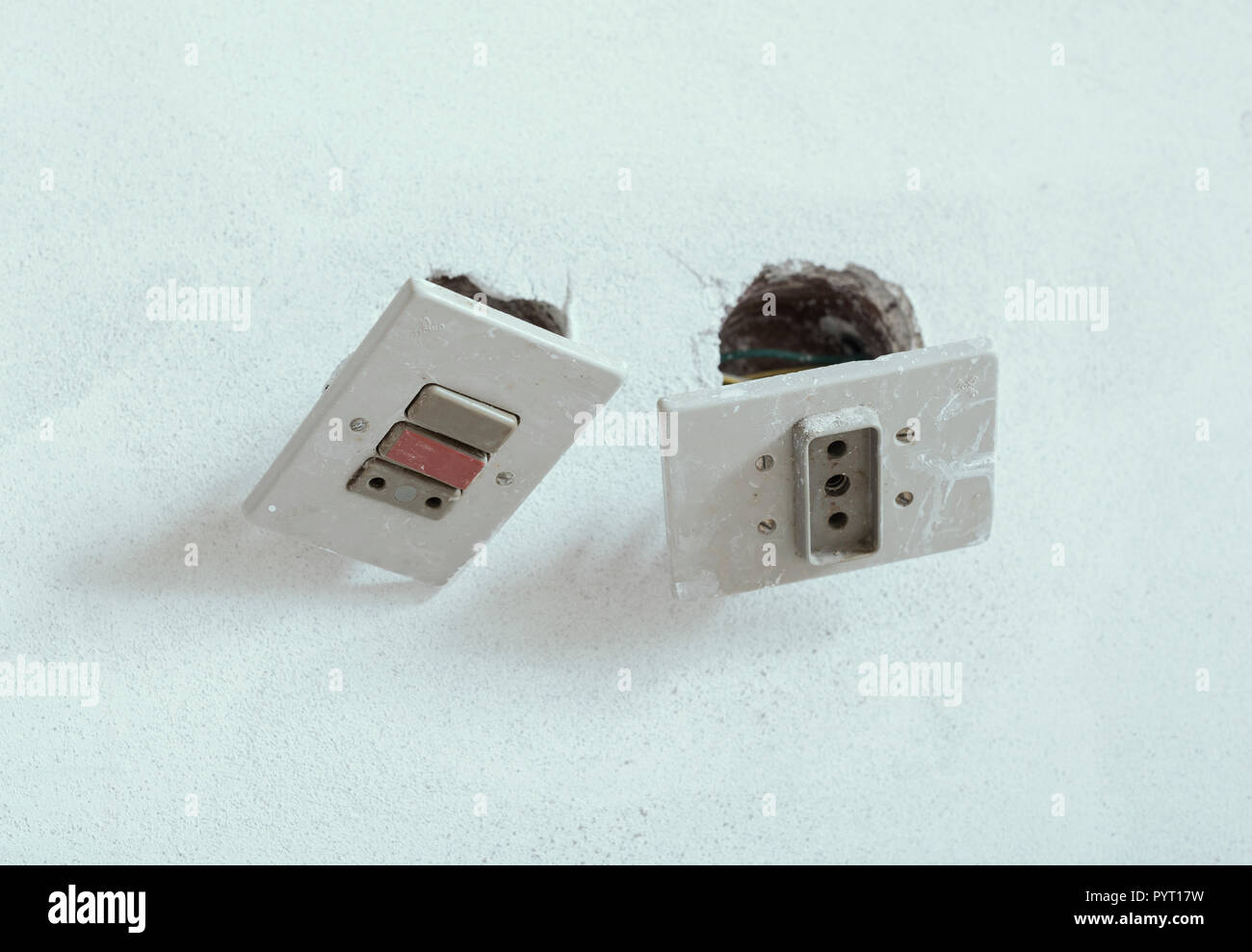 Wall socket installation and renovation, close up of old socket and ...