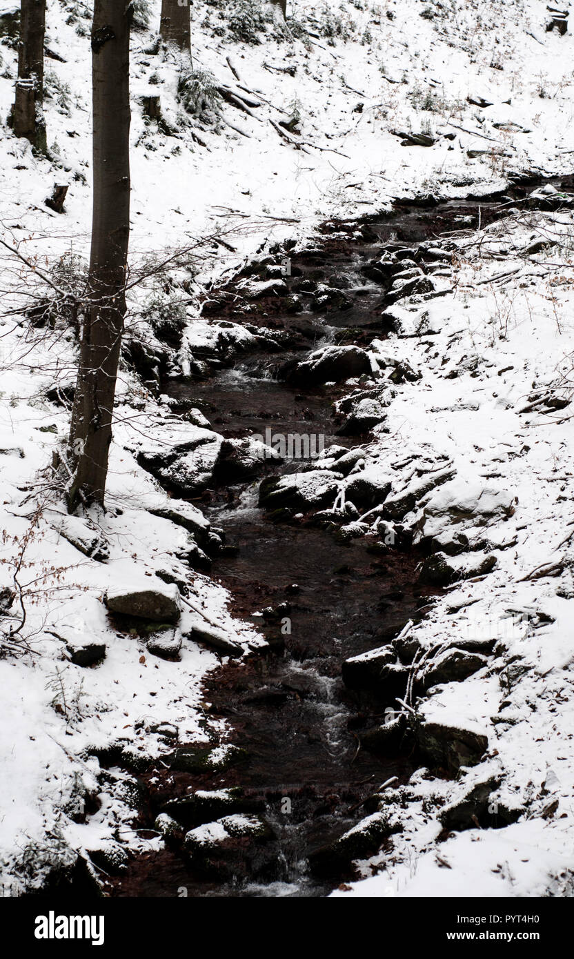 Mountain river among snow covered hi-res stock photography and images ...