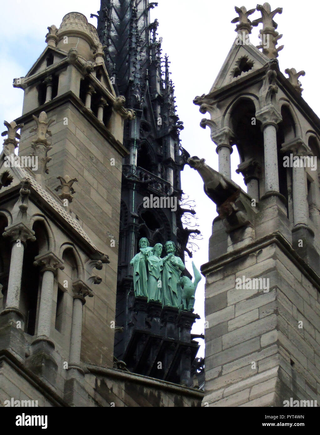 Copper statues of the apostles can be seen among the architecture of ...