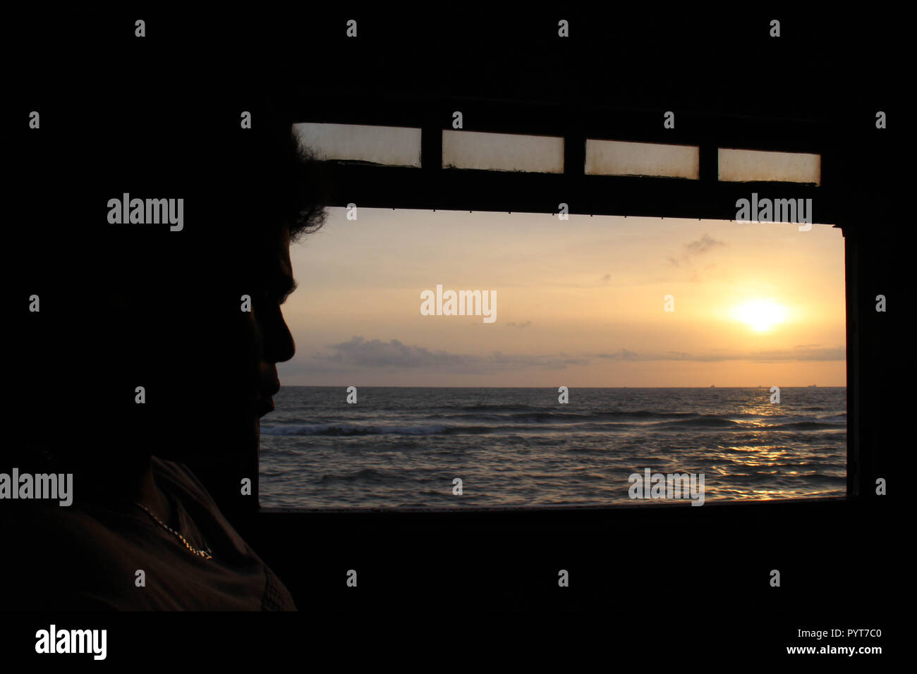 Sunset from a train on the way from Galle to Colombo. Taken in Sri ...