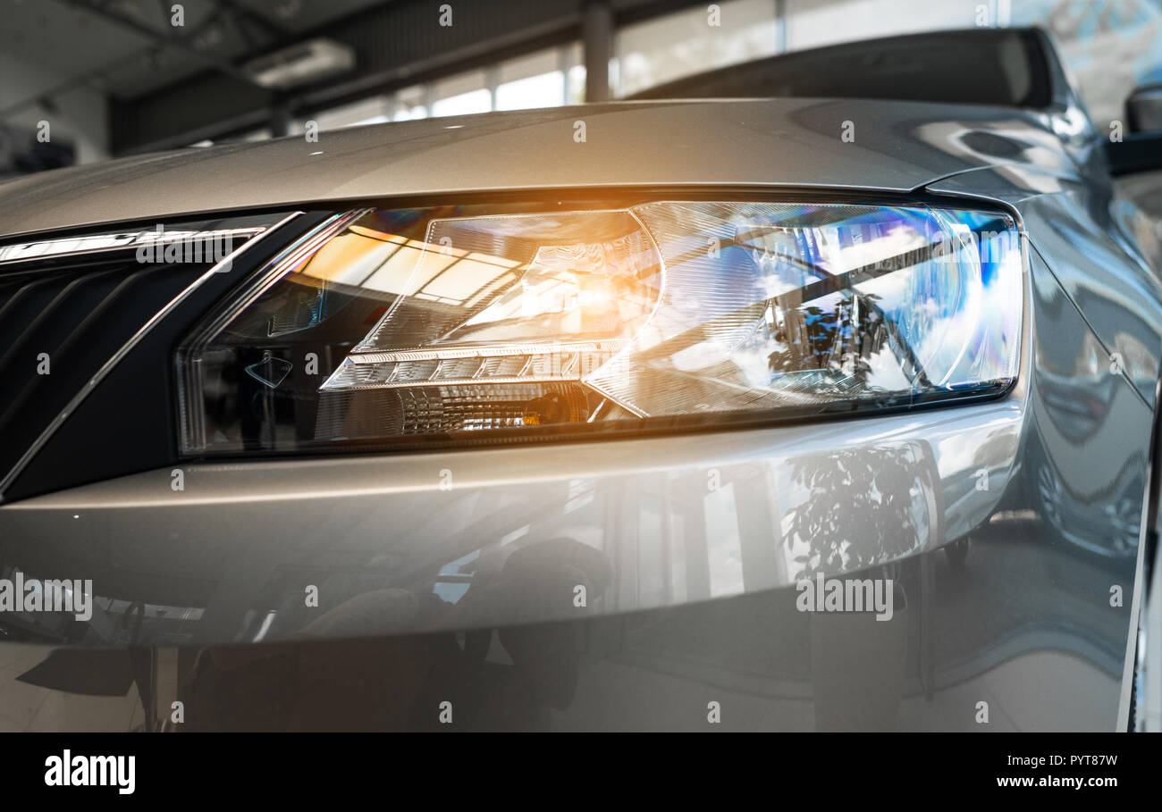 The headlamp of a modern prestigious car from a close angle Stock Photo ...