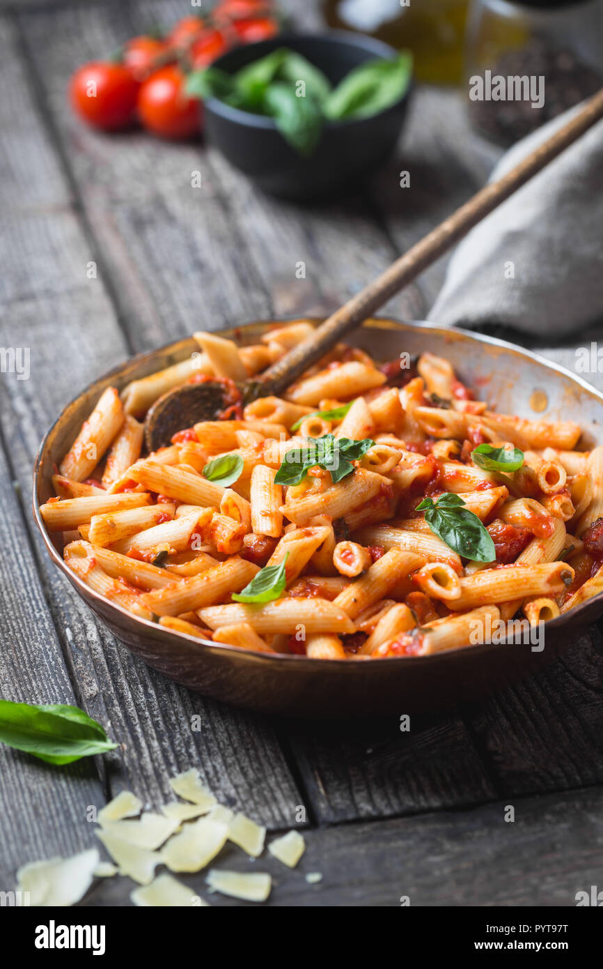 Penne pasta in tomato sauce Stock Photo - Alamy