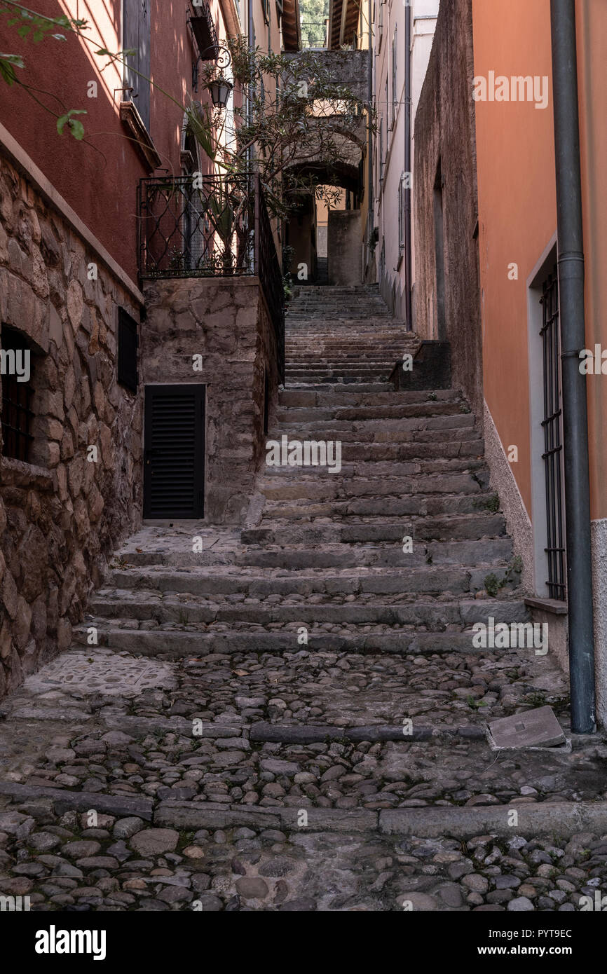 Narrow alley in Varenna on Lake Como in northern Italy Stock Photo - Alamy