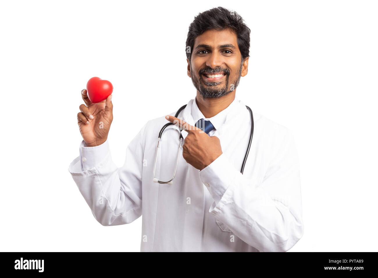 Friendly cardiologist or doctor indicating red heart shape with index ...