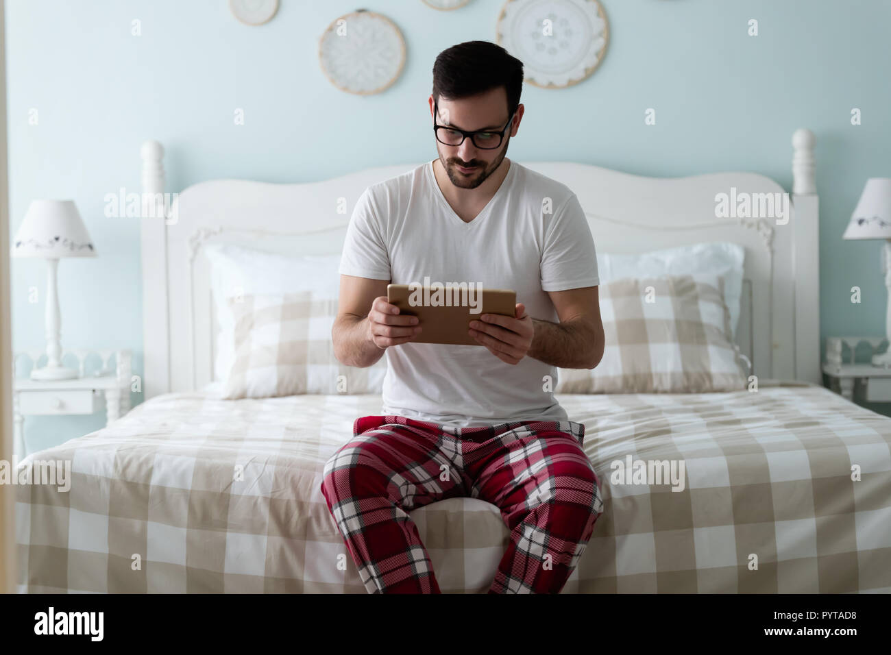 Young man bed hi-res stock photography and images - Alamy