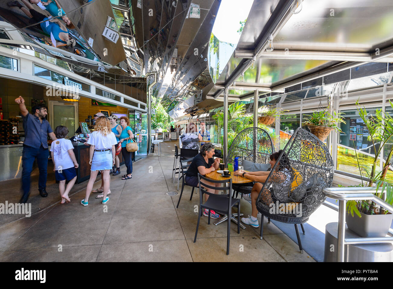 Visitors sat in a coffee shop at Cairns Botanical Gardens, Far North ...