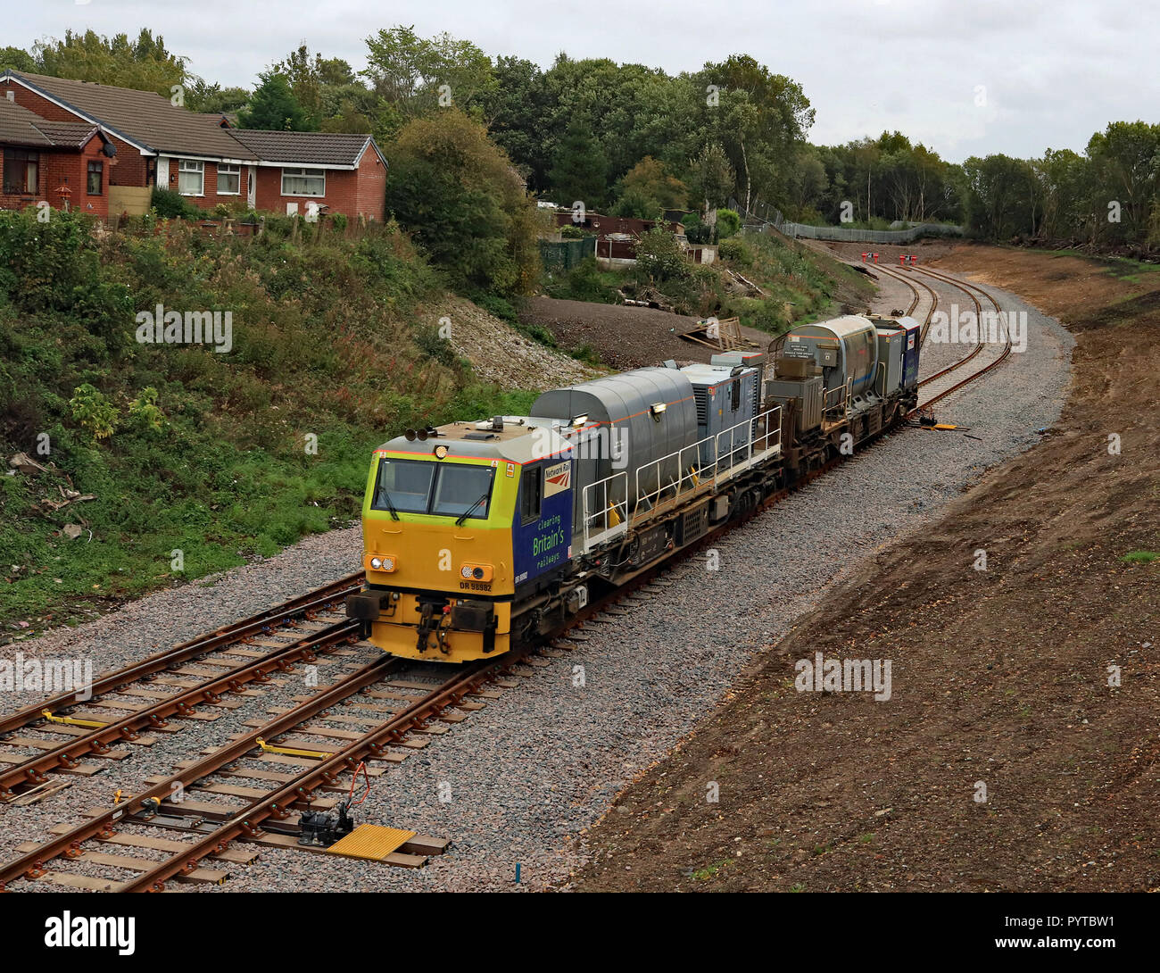 Pressure washing the leaves form the railway lines hi-res stock ...