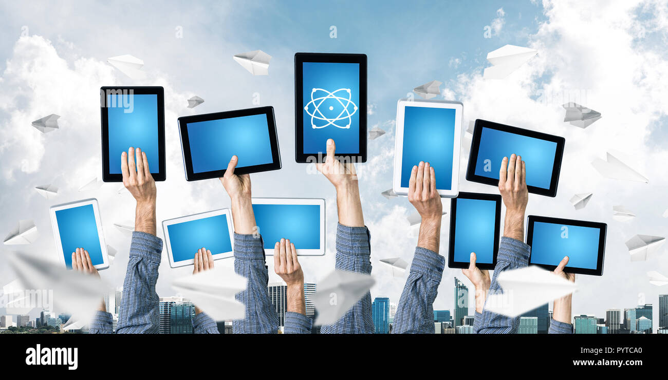 Close of man hands in line showing tablet pc with blank blue scr Stock ...