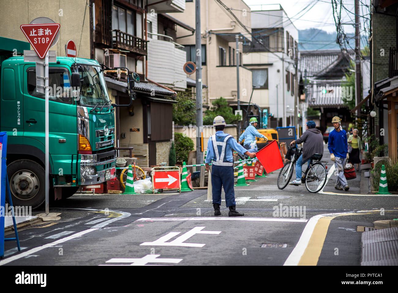 Asian directing traffic intersection hi-res stock photography and ...