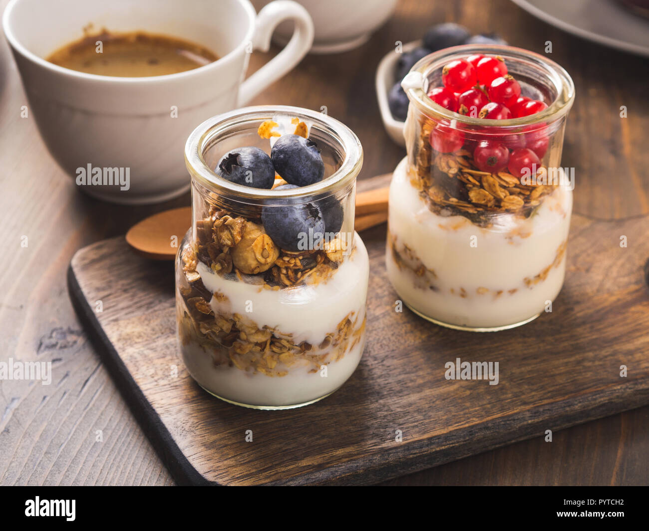 Cozy Breakfast concept on dark wooden textured background. Coffee and ...