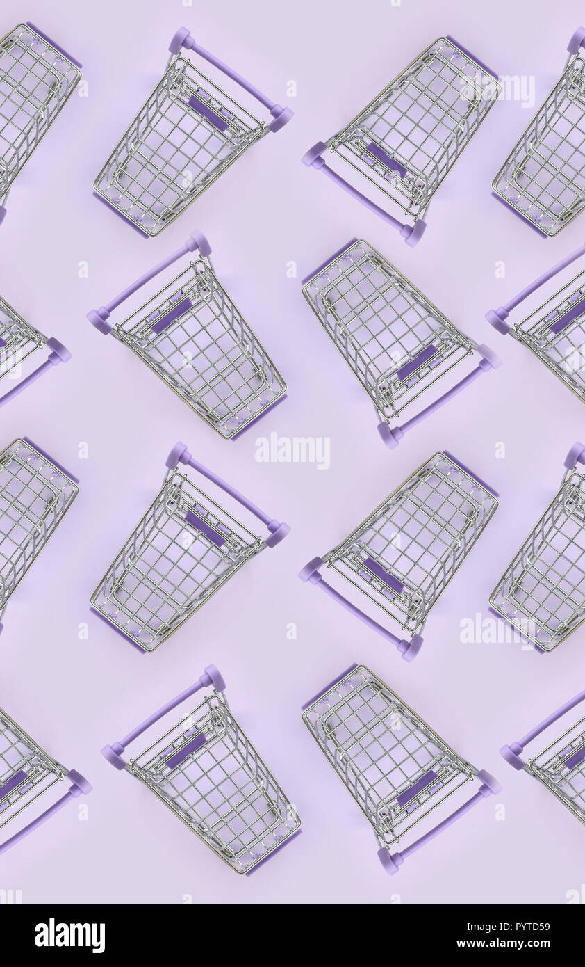 Pattern of many small shopping carts on a violet background. Minimalism ...