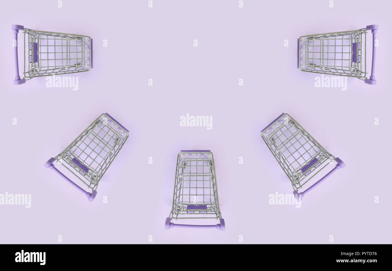 Pattern of many small shopping carts on a violet background. Minimalism ...