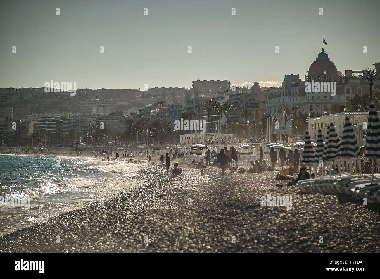 Seaside resort on Nice beach in France during summer time. A ...