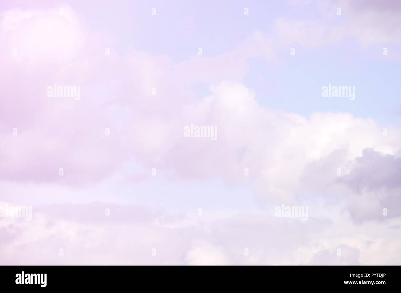 A blue sky with lots of white clouds of different sizes Stock Photo - Alamy