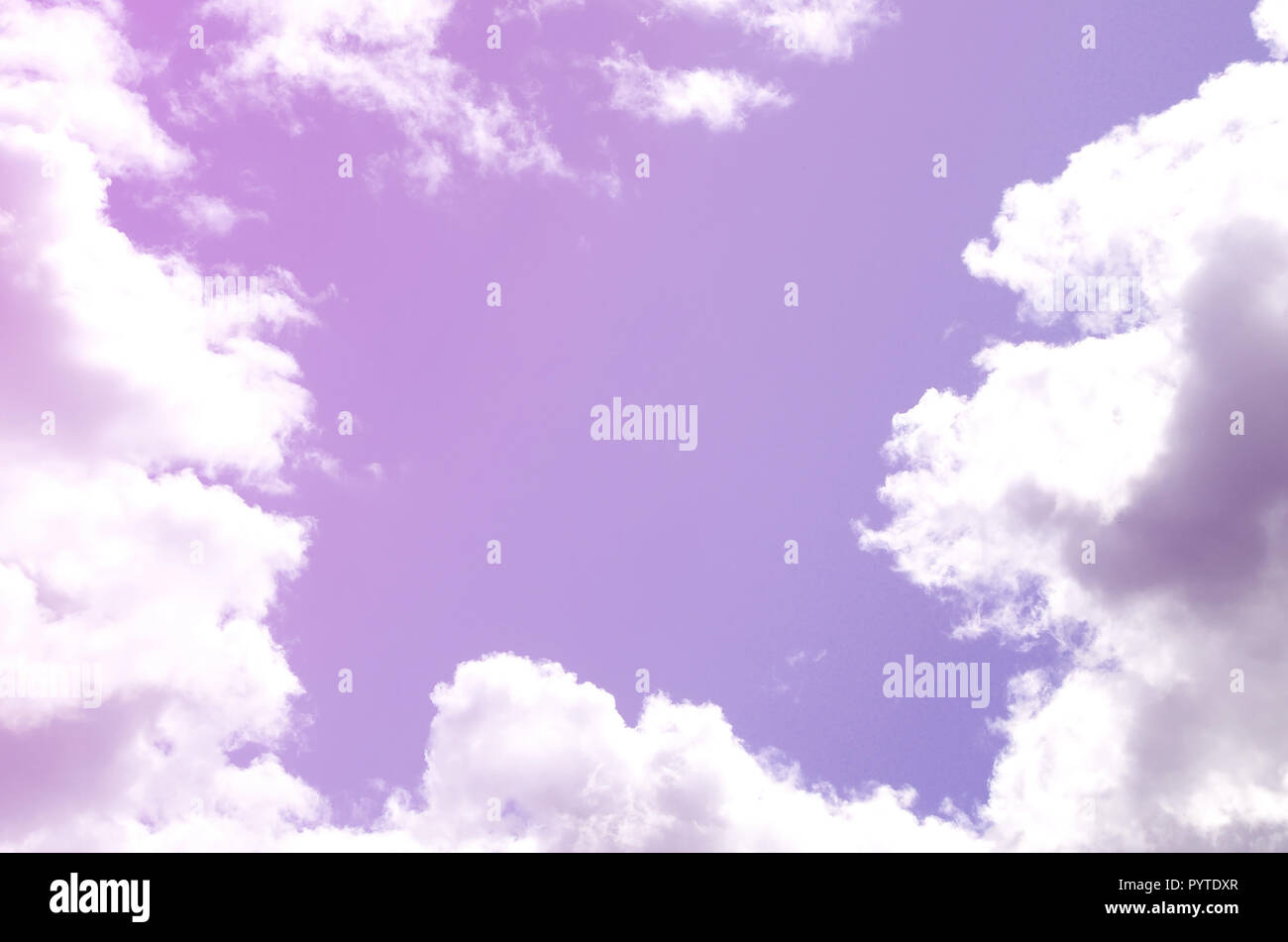 The blue sky with a lot of white clouds of different sizes, forming a ...
