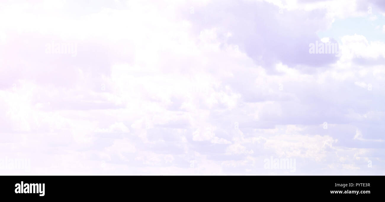 Heavenly space of blue color with a lot of thick white clouds ...