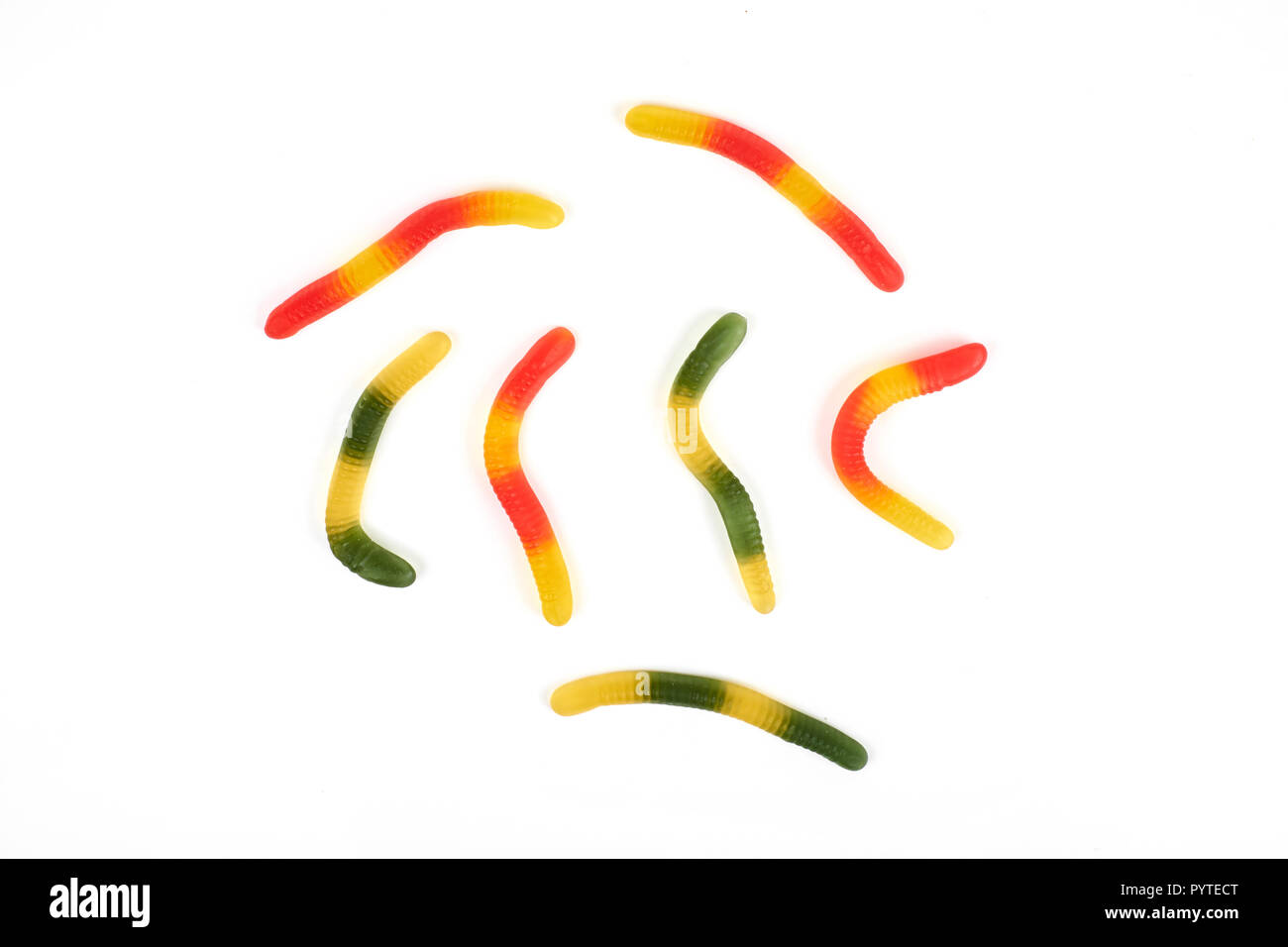 gummy jelly worm candy on a white background Stock Photo - Alamy
