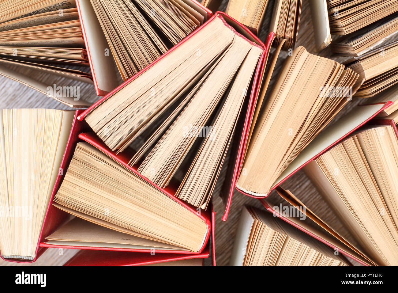 Mass of old books. Used hardback books. View from above. Education ...
