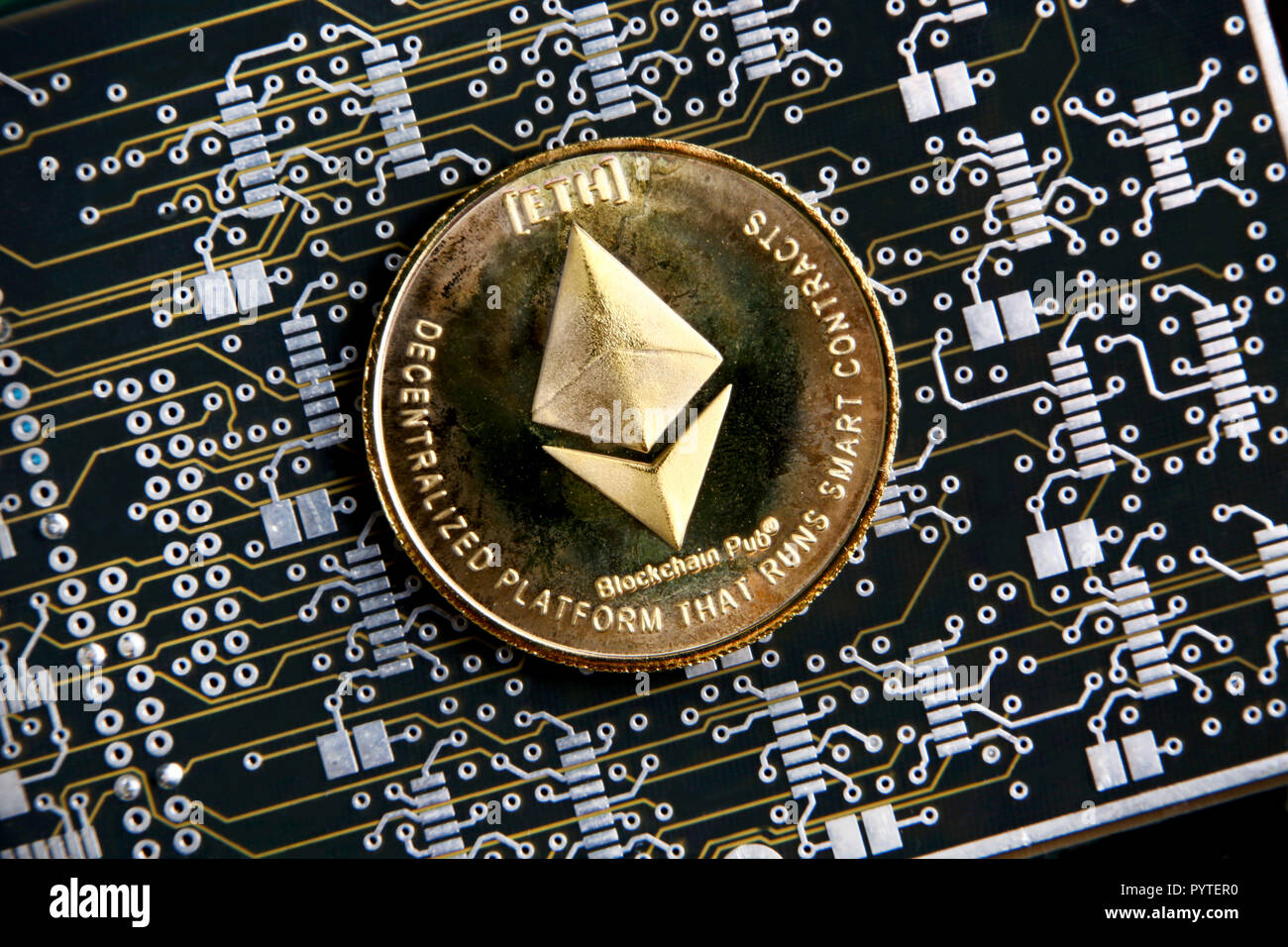 Ethereum ETH gold coin representing cryptocurrencies, against a ...