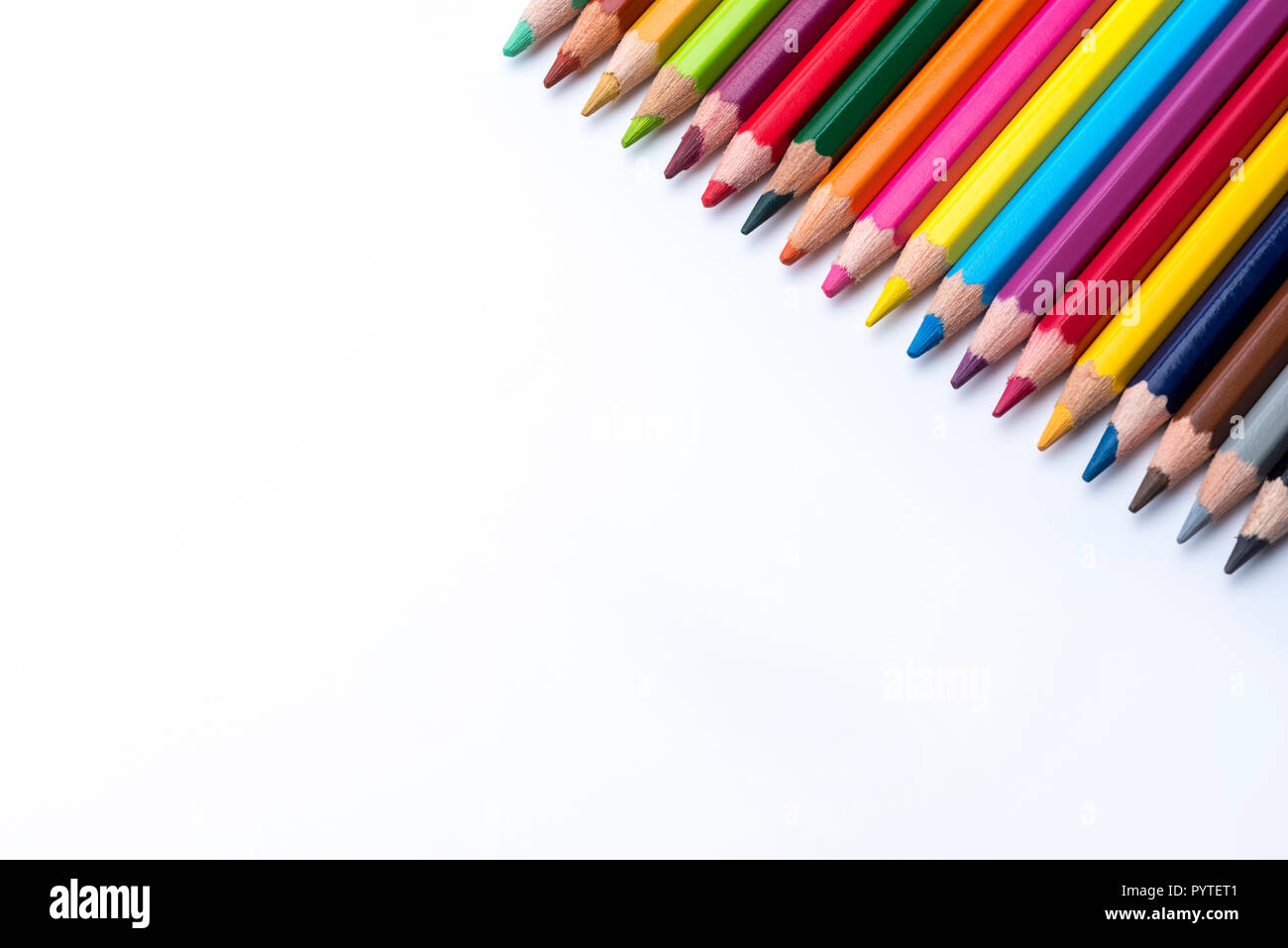 Colored pencils, on a white background close-up in the upper right ...