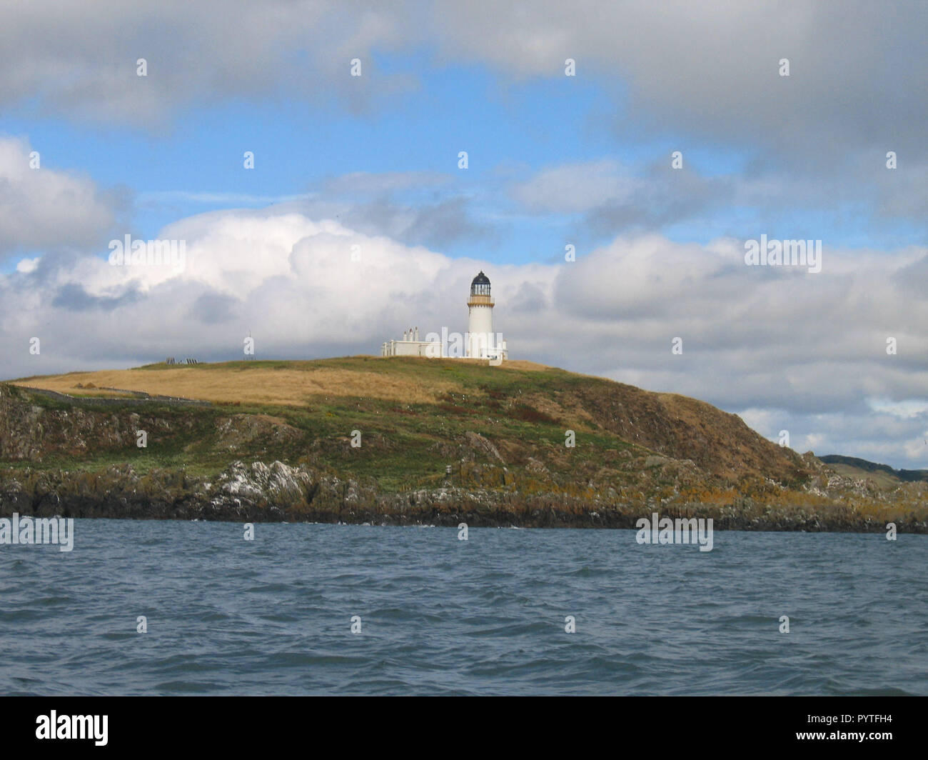 Little Ross lighthouse on Little Ross Island seen from a boat looking ...