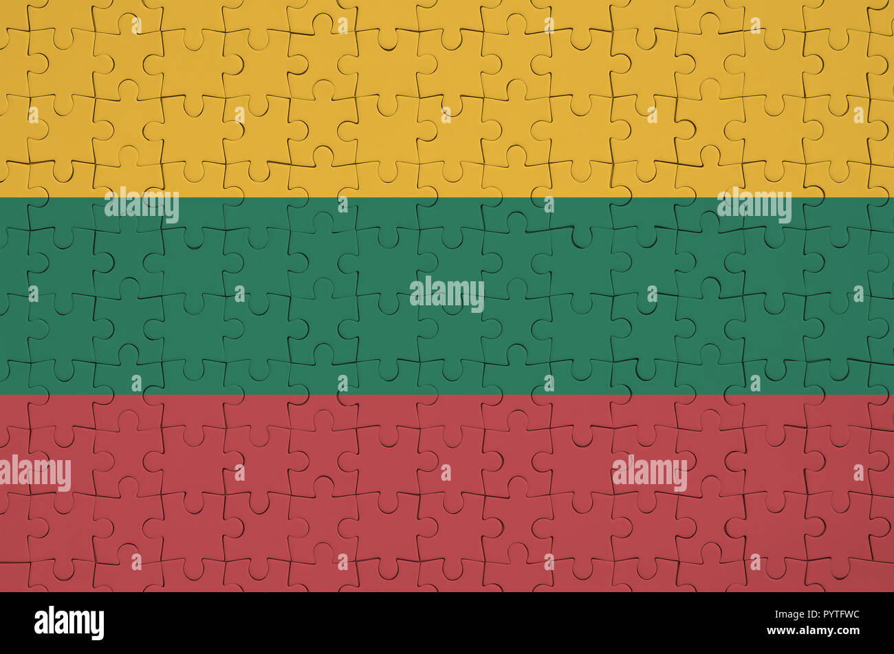 Lithuania flag is depicted on a folded puzzle Stock Photo - Alamy