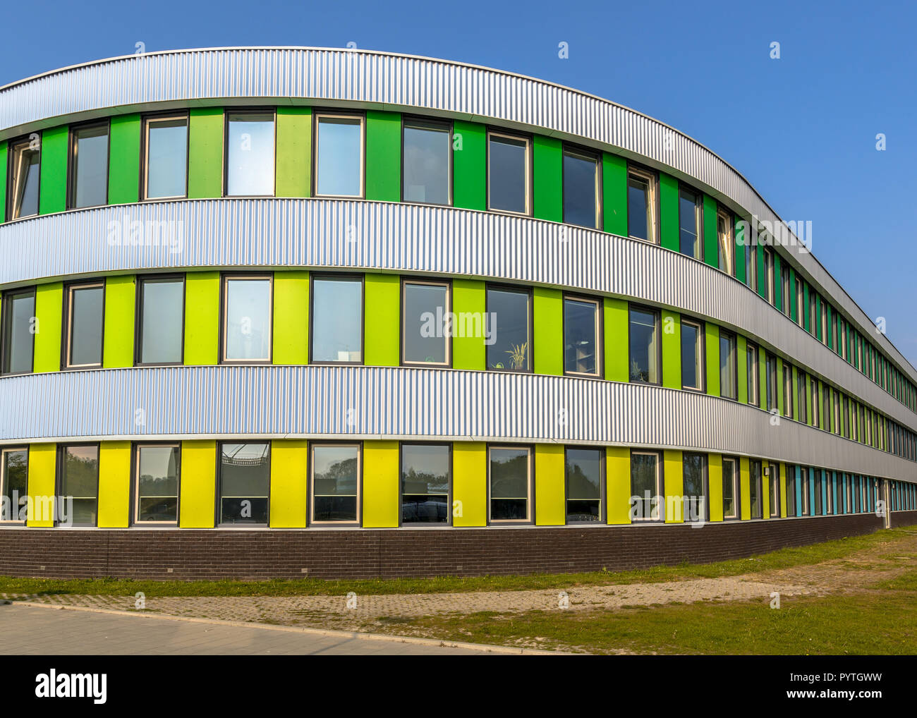 Architecture detail of high school in bright colors and curved design ...