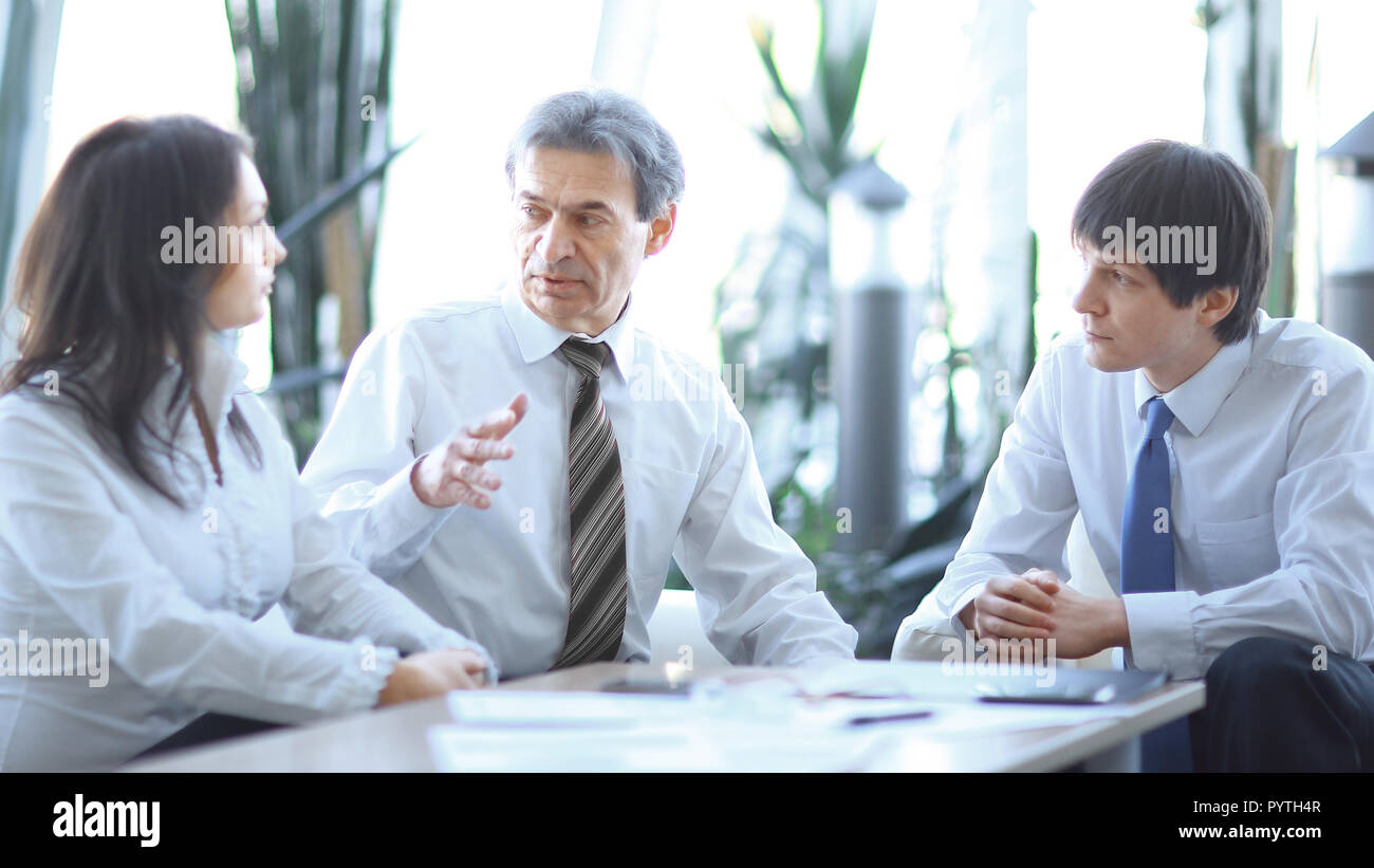 project leader talking to business team in the workplace Stock Photo ...