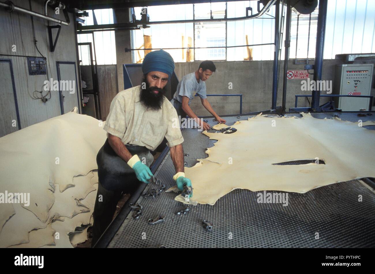 Italy, Sikh Indian immigrates working in a tannery, Arzignano (Vicenza ...