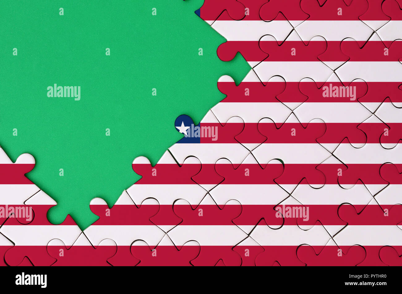 United States of America flag is depicted on a completed jigsaw puzzle ...