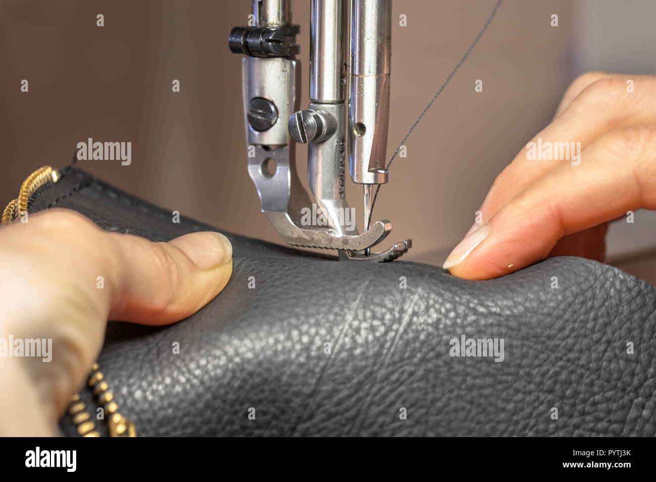 Professional sewing hi-res stock photography and images - Alamy