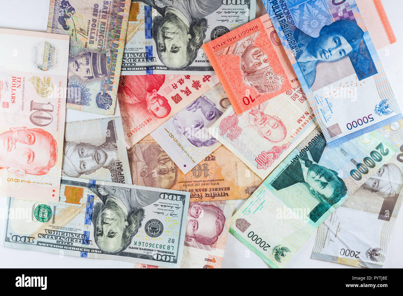Multiple Currencies banknotes as colorful background showed the global ...