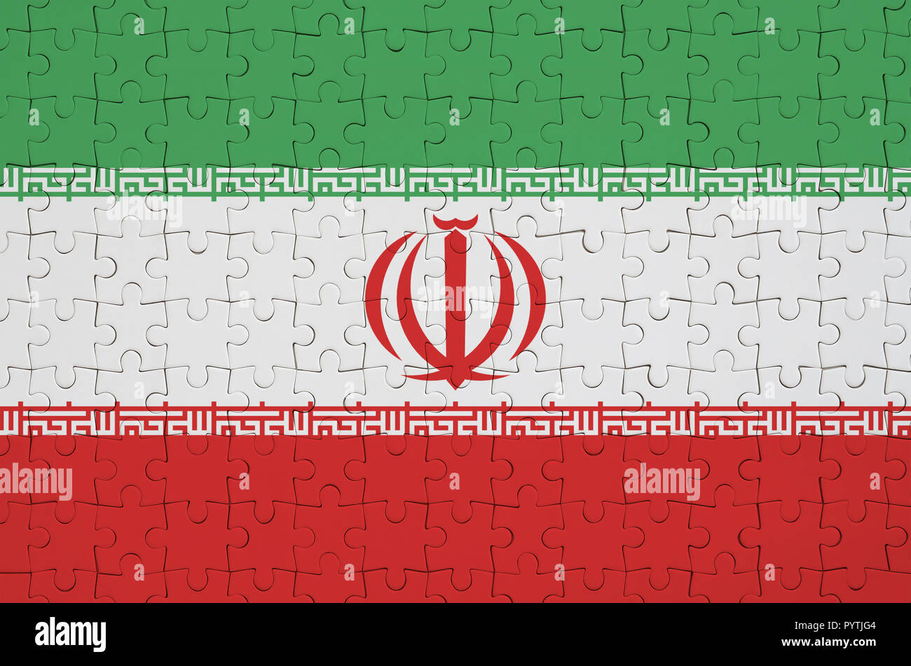 Iran flag is depicted on a folded puzzle Stock Photo - Alamy